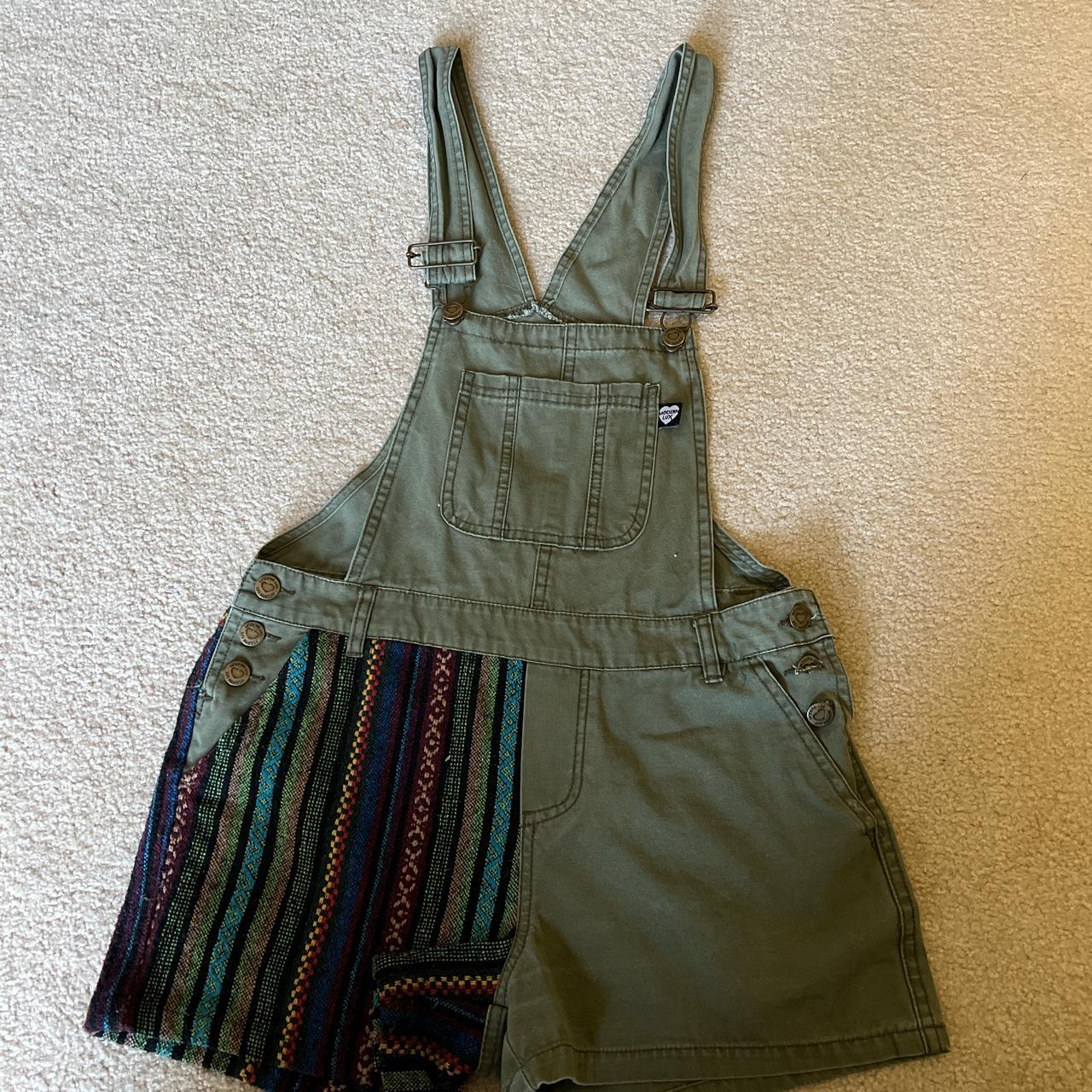 Green overalls with a design pattern on the leg. - Depop