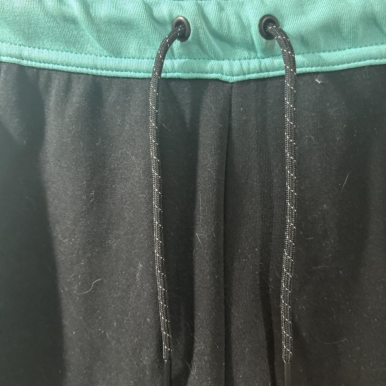 Real black Doja tech fleece Nike pants - Depop