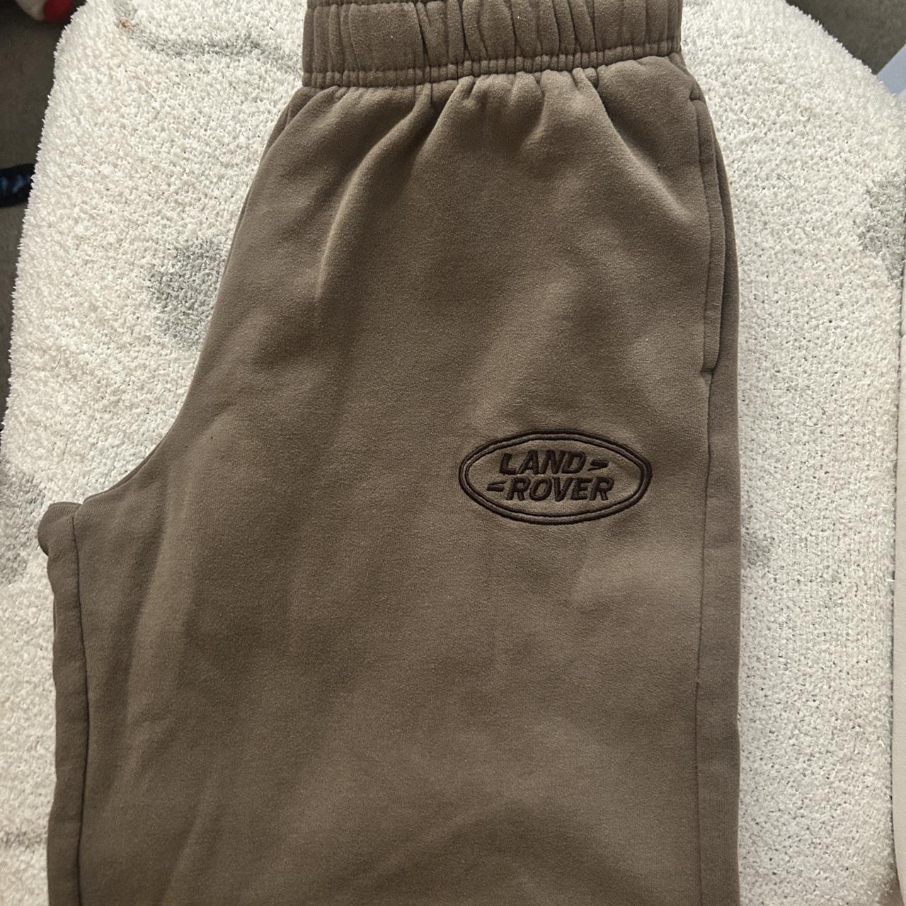 BROWN LAND ROVER SWEATPANTS FROM PACSUN. SIZE EXTRA... - Depop