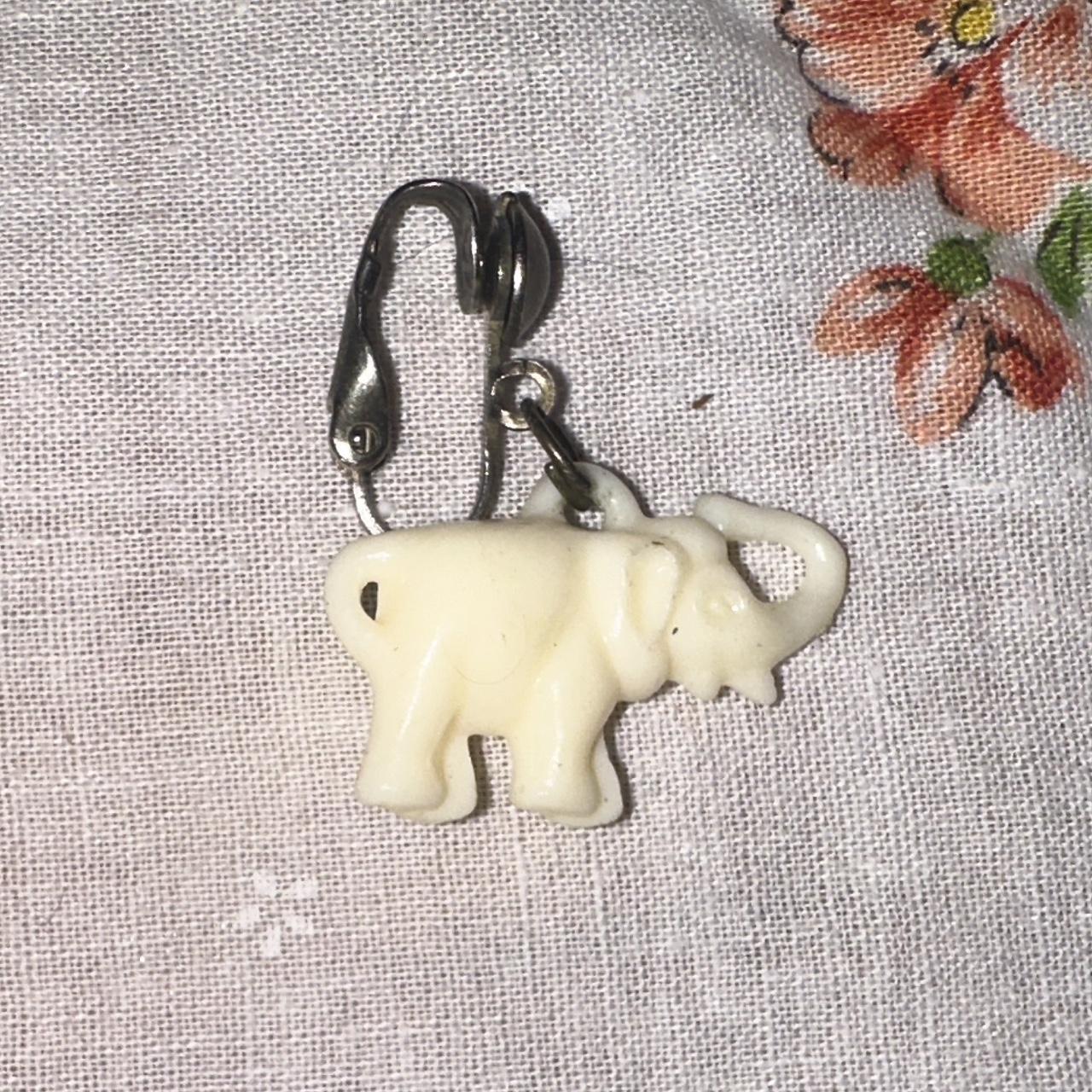 SINGULAR EARRING white elephant clip on earring with... | Depop