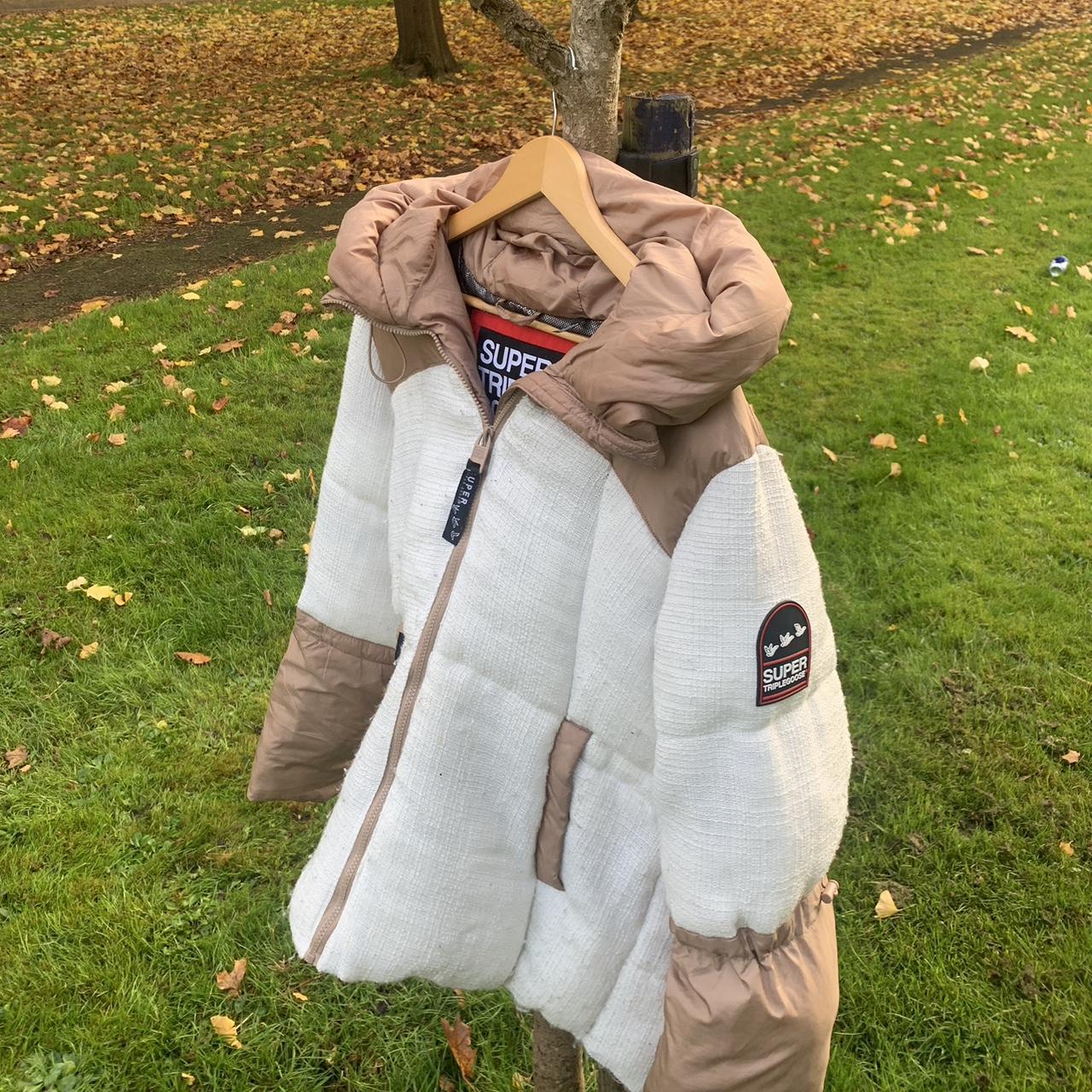 White and cream puffer jacket. Insulating material... - Depop