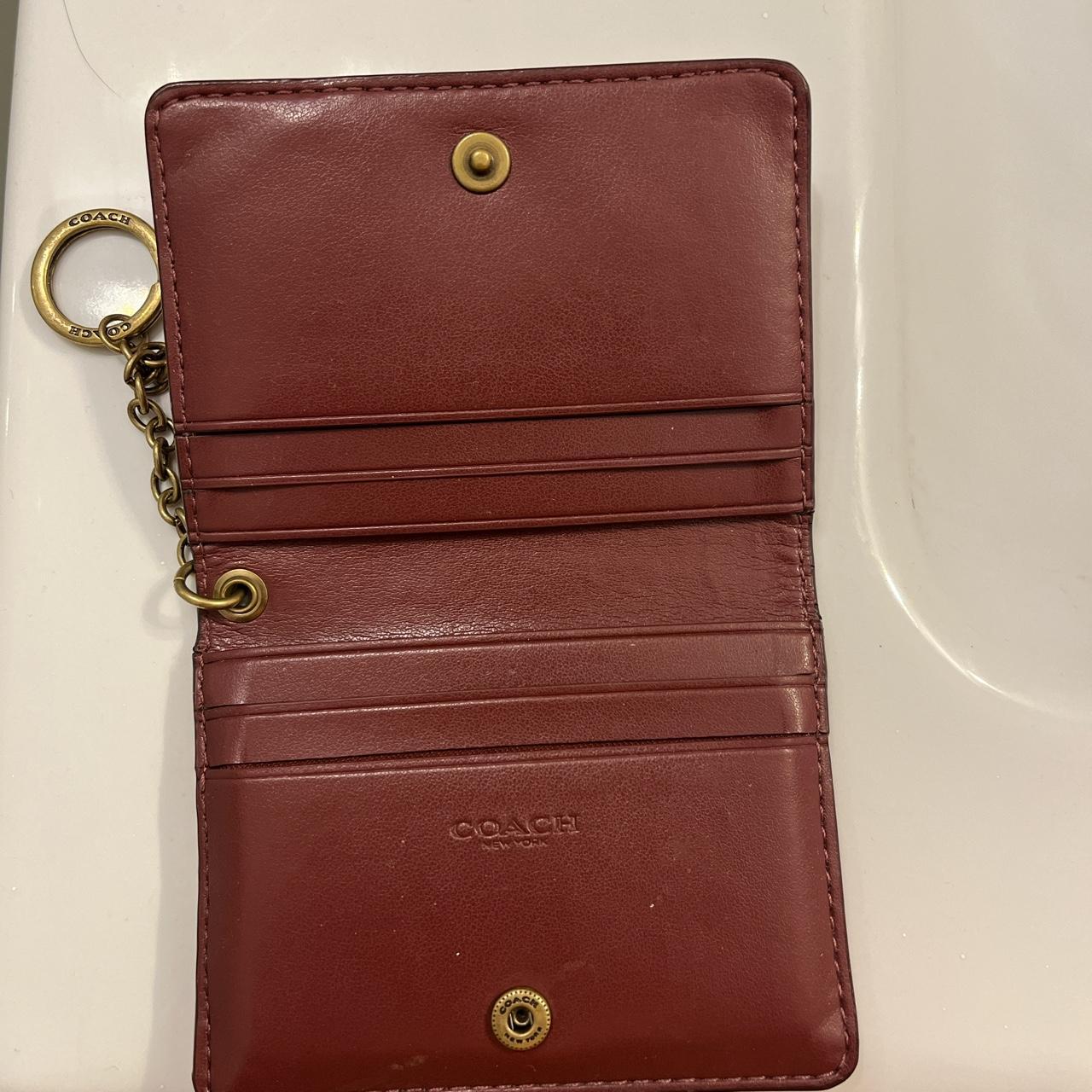 Pink 7-slot Coach card holder. Great condition. Fits... - Depop