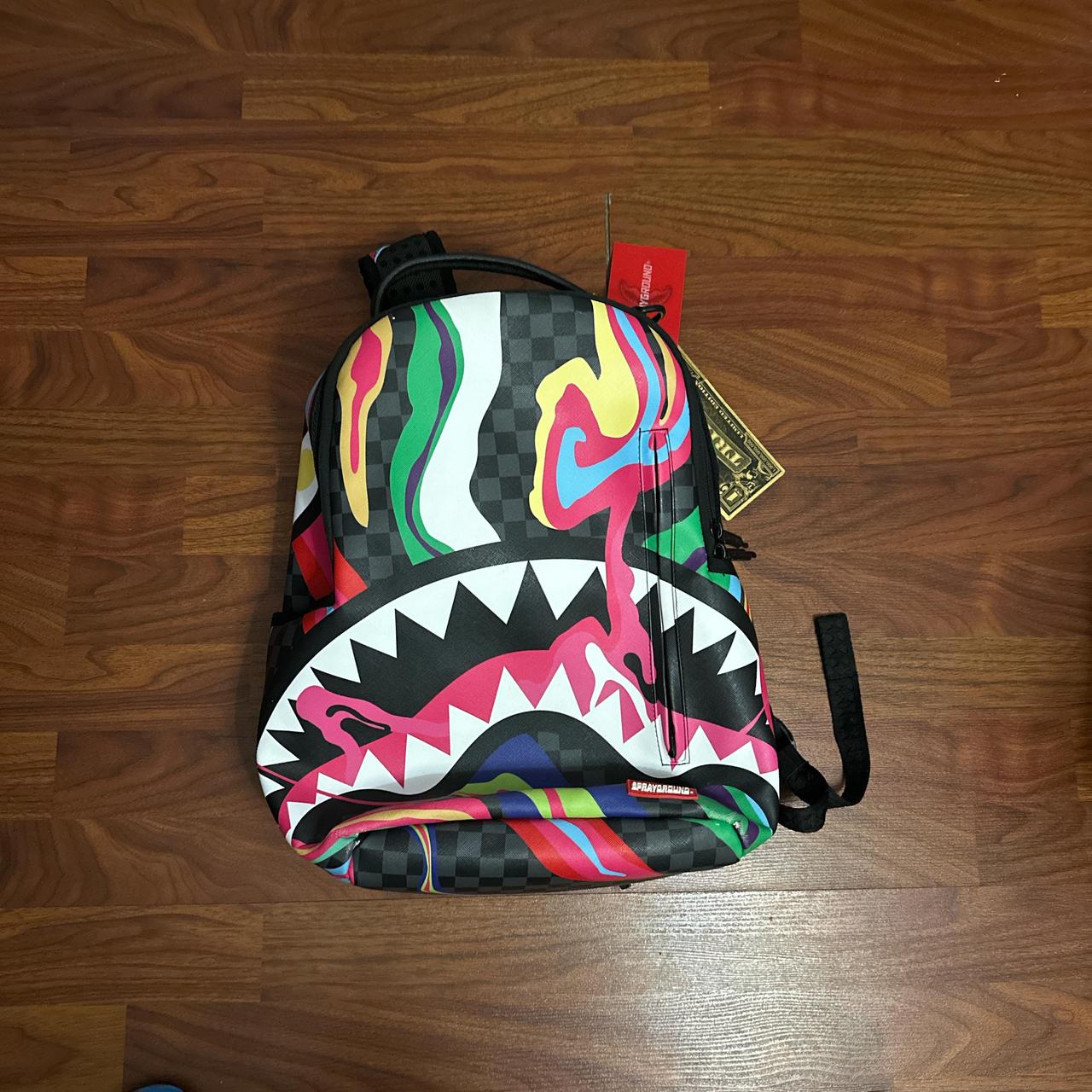 sprayground multicolor backpack it’s like brand new... | Depop
