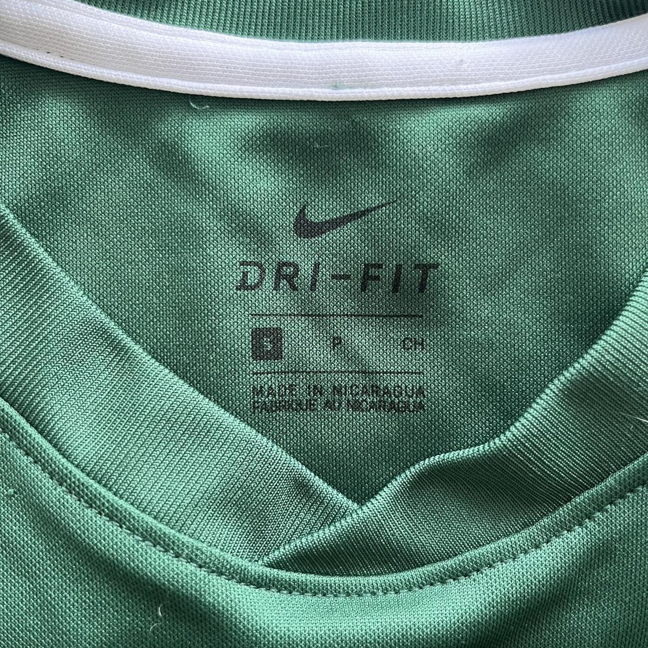 Green running T-shirt from Nike, with V-neck.... - Depop