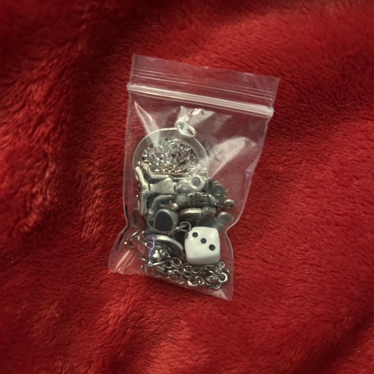 Silver mystery charm bag some may be scratched or... - Depop