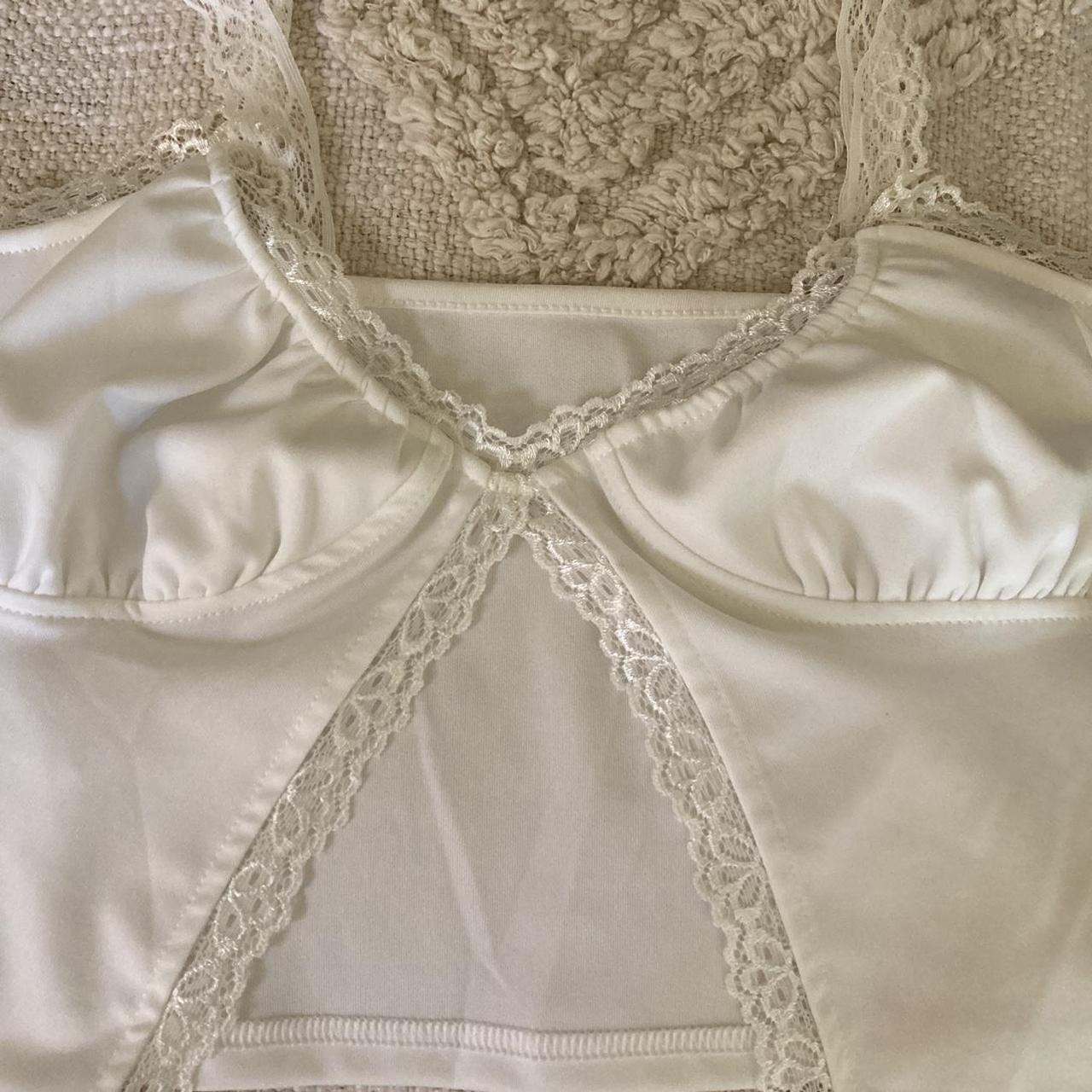 Split front cami featuring floral lace detailing,... - Depop