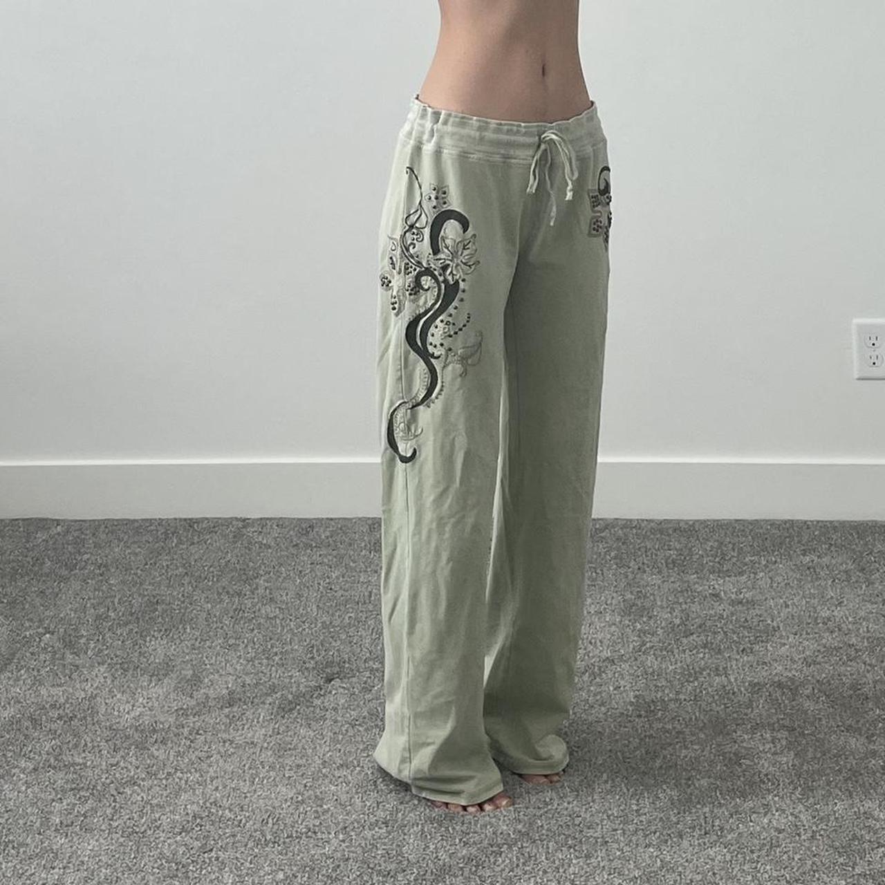 Super beautiful low rise green sweats with flower... - Depop