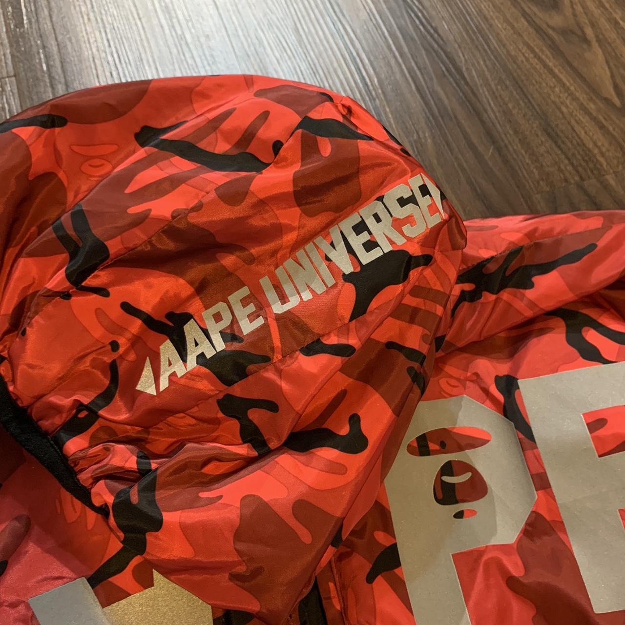 AAPE camo reversible puffer jacket, fits like Size... - Depop