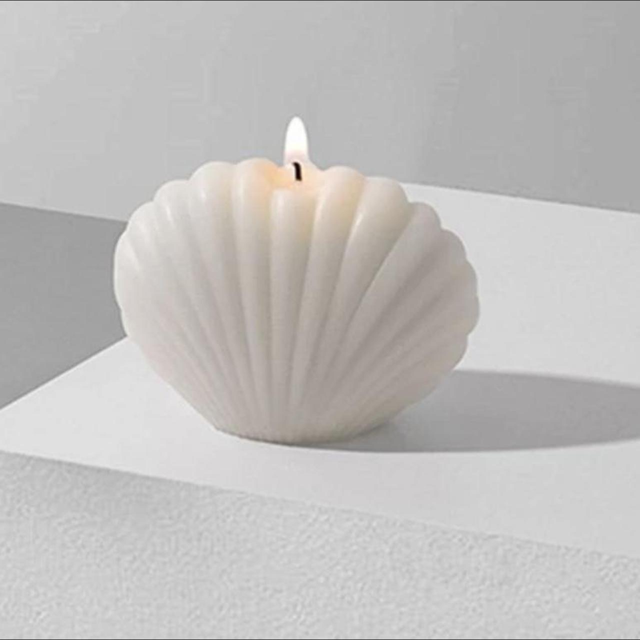 Shell shaped beautiful candle Great to add as decor... - Depop