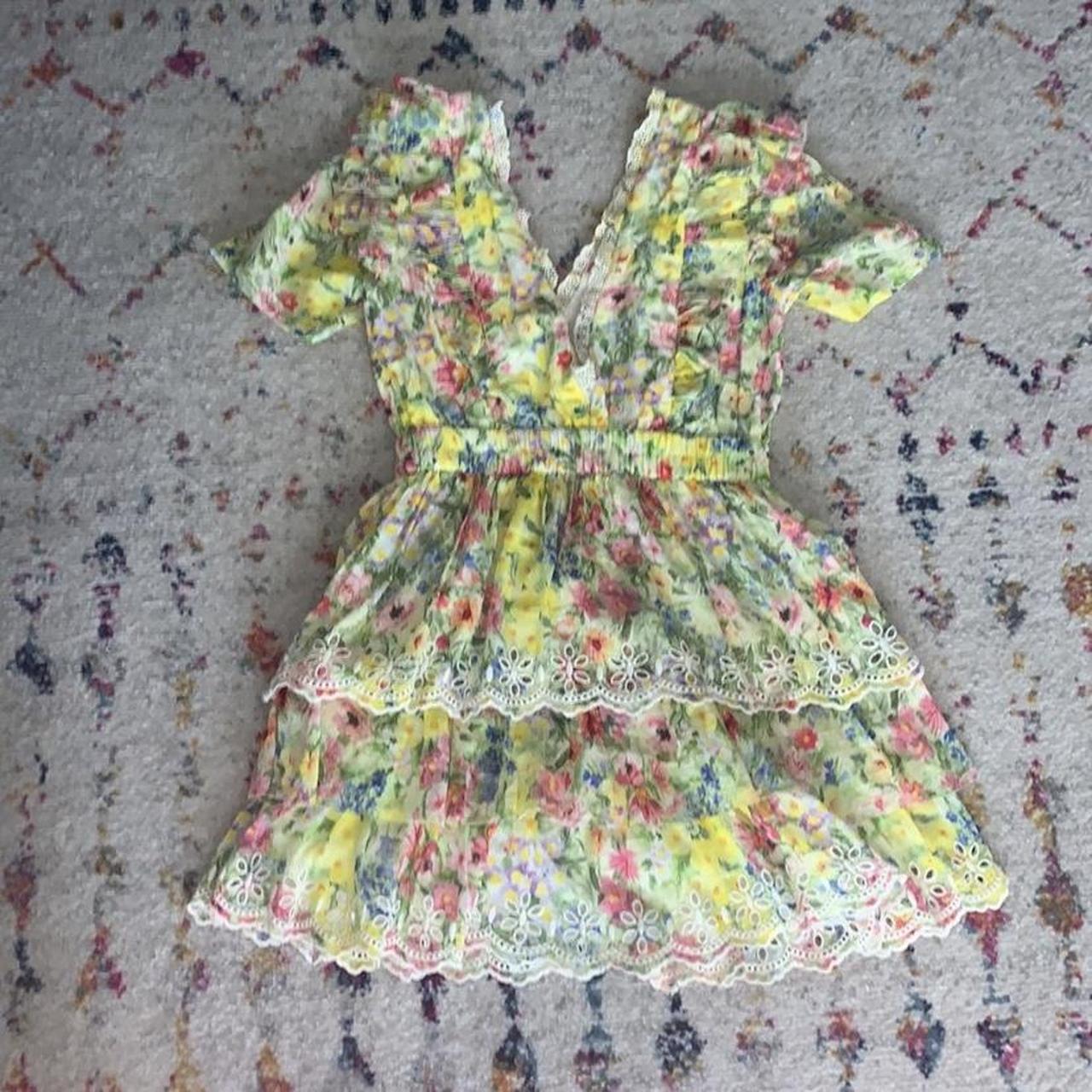 Floral mini dress Missing the middle button in the... - Depop