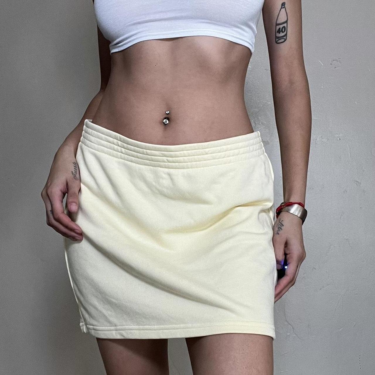 TNA Yellow Fleece Sporty Mini Skirt Large... - Depop