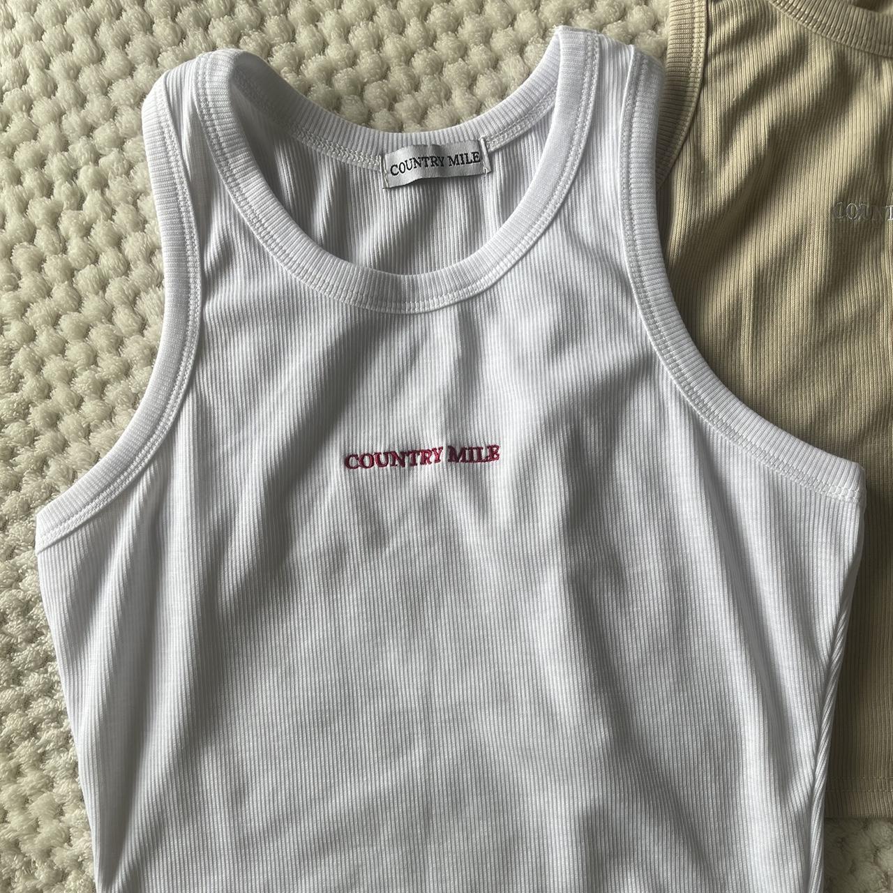 Country mile singlets BNWT Size 8-10 $15 each - Depop