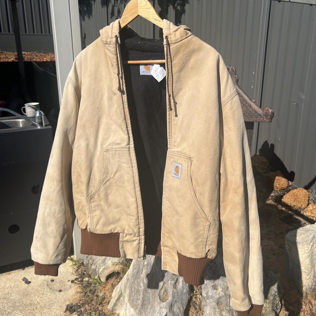 Carhartt Tan jacket Vintage look, good fade Size... - Depop