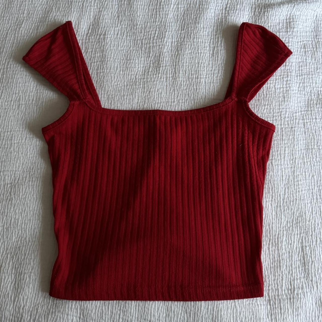 Red ribbed tank top with flared sleeves Size:... - Depop