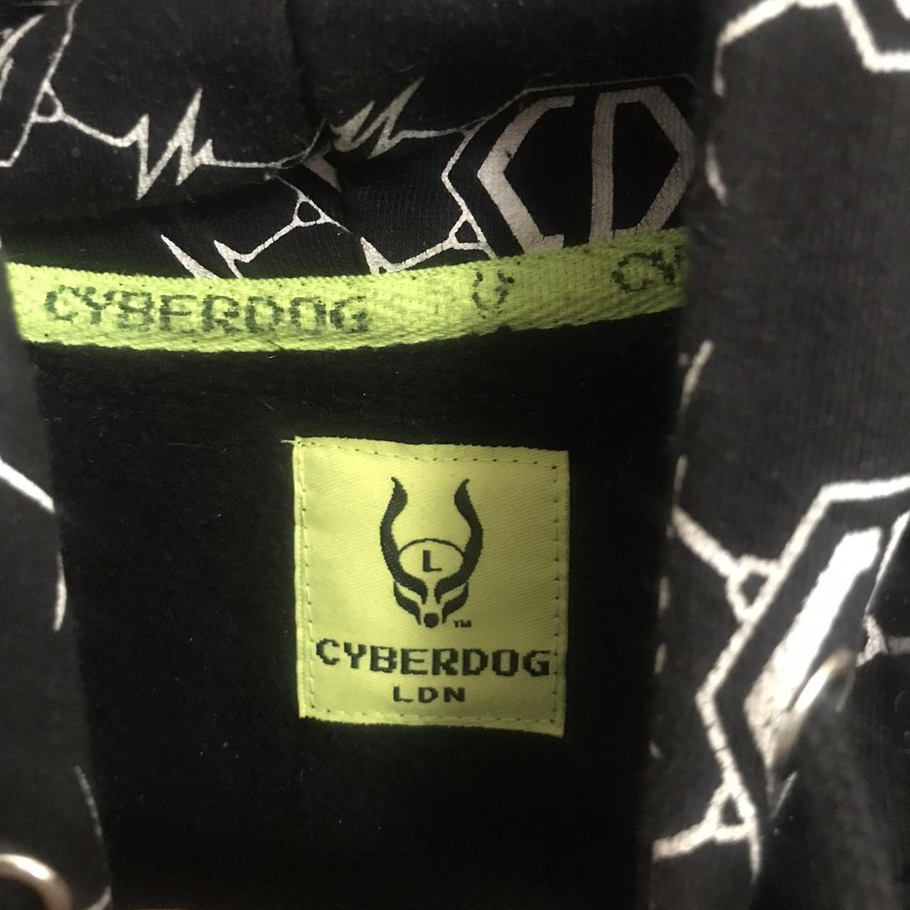 Cyberdog Unisex Oversized Hoodie in Black and... - Depop