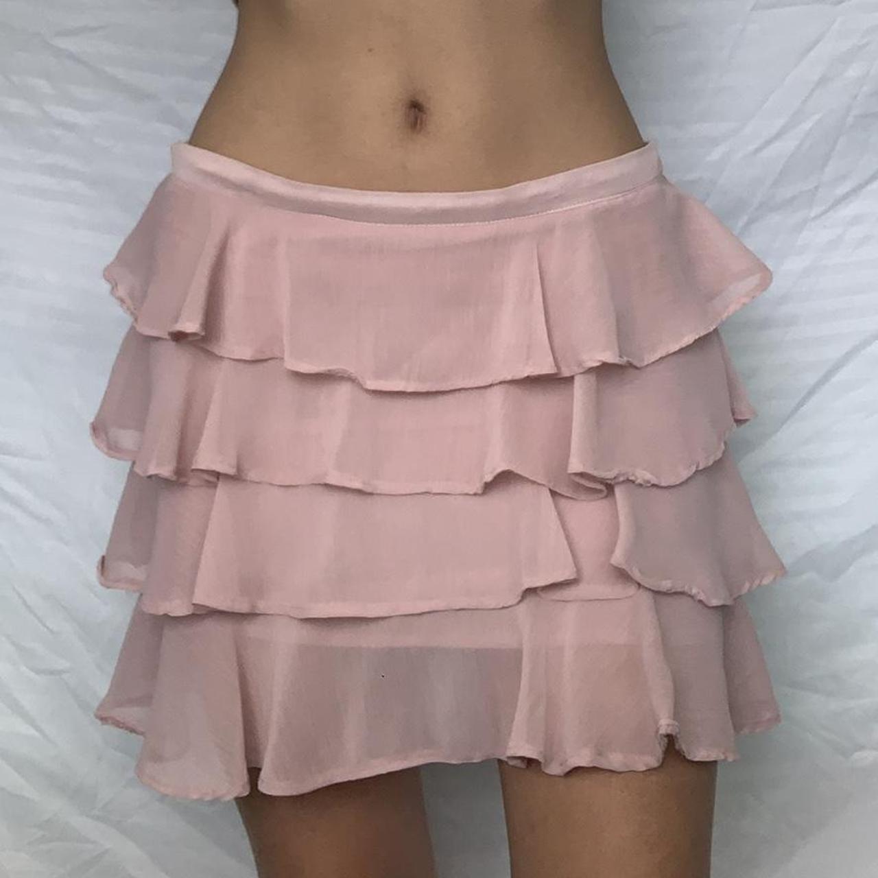 Papaya pink ruffle skirt no tag but fits like a size... - Depop