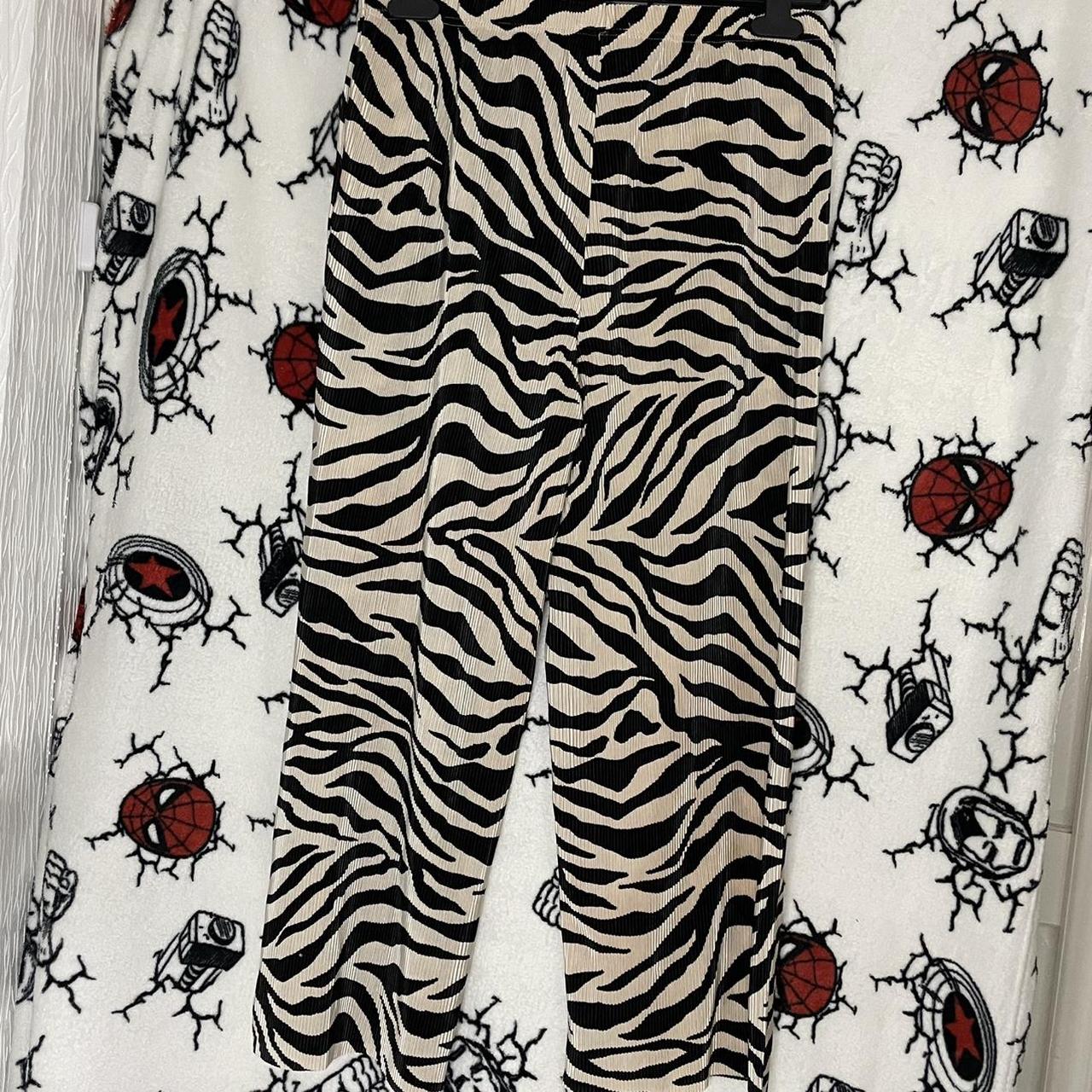 Size 12 wide leg zebra print trousers, ribbed... - Depop