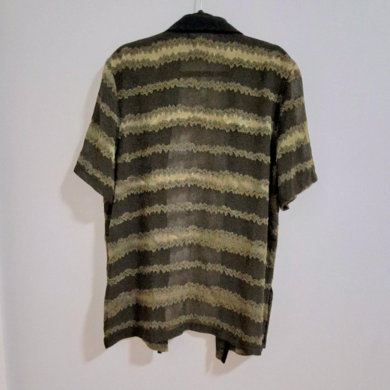 Green sheer short sleeved top. Great as a jacket or... - Depop