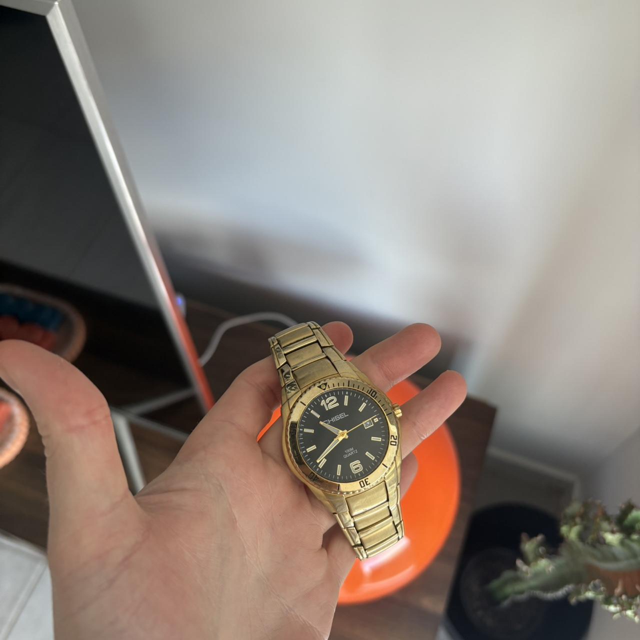 Gold Chisel 100m quarts analogue watch with black... | Depop