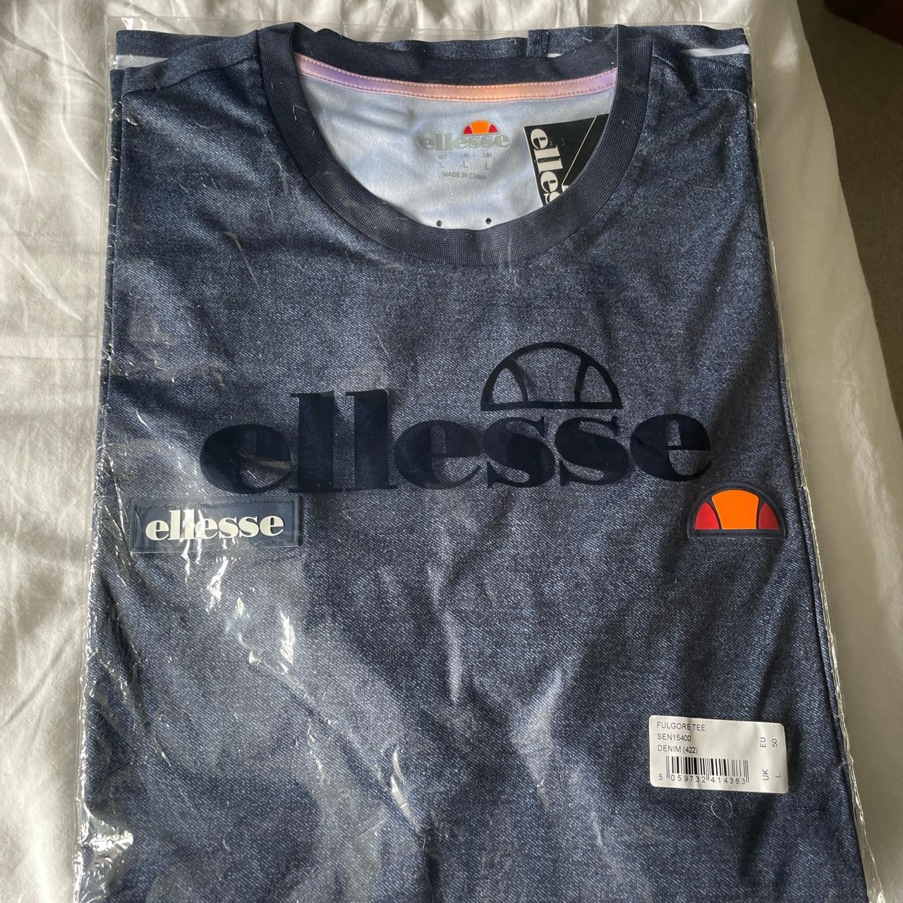Brand new Ellesse navy fulgore sports tee in navy... - Depop