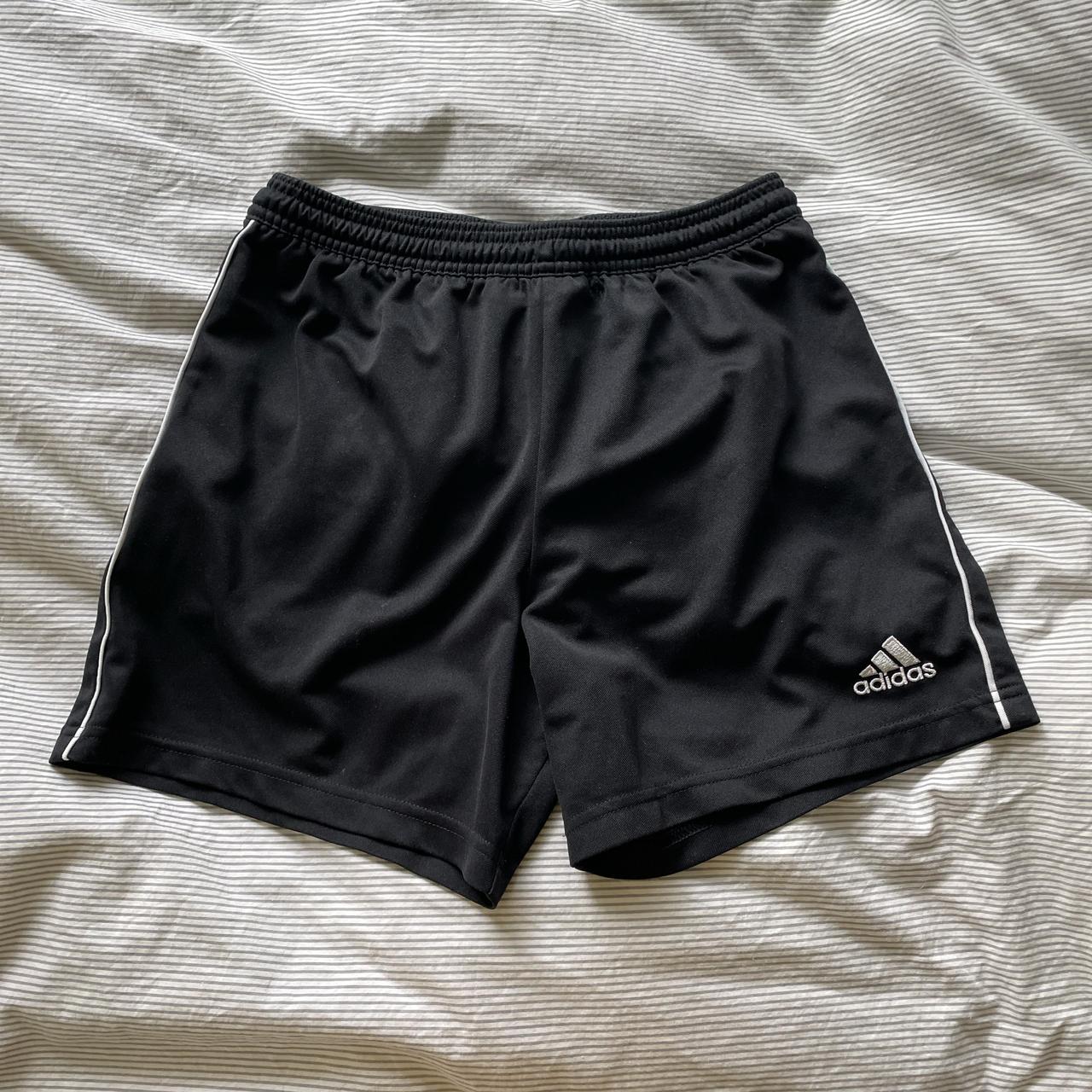Black adidas shorts with single stripe Fits like... - Depop