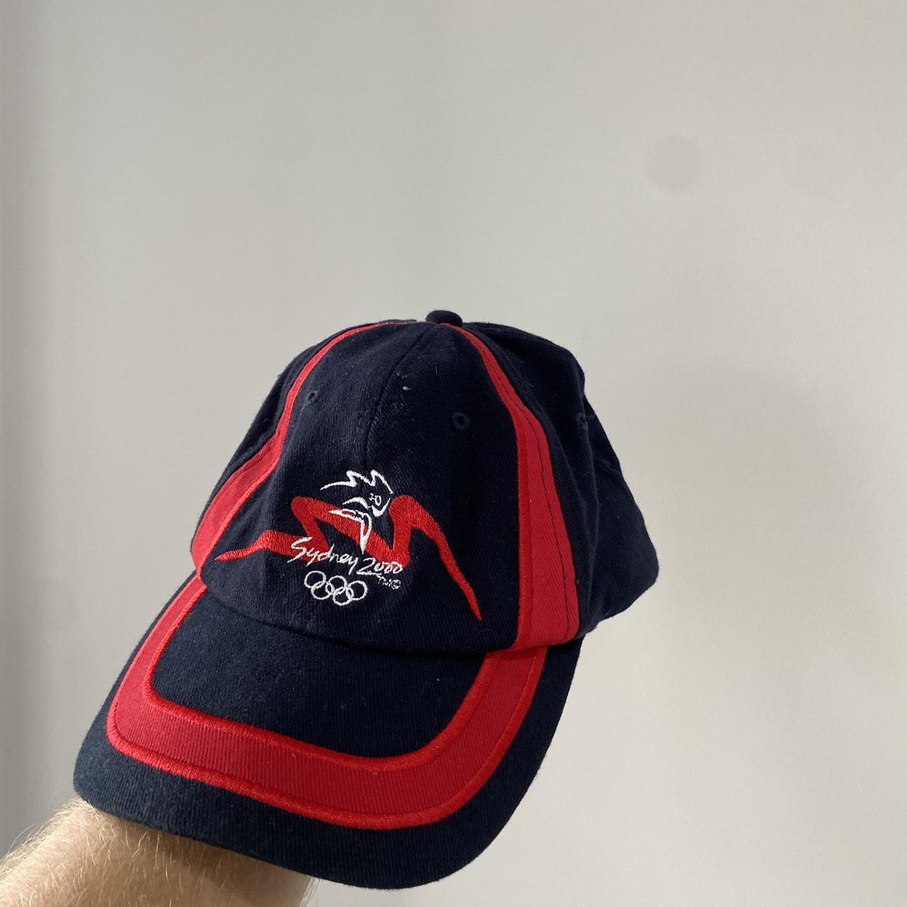 Sydney 2000s navy and red cap with a cool design on... - Depop