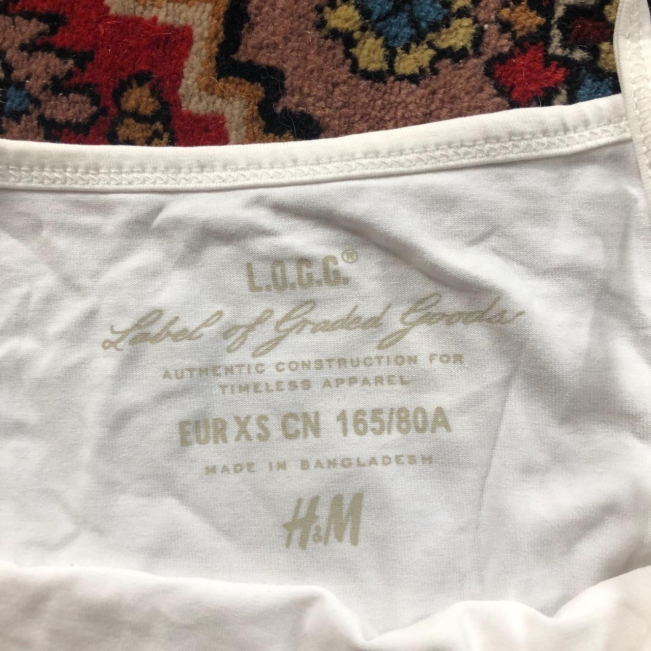 White H&M (Label of Graded Goods) tanktop. Euro XS.... - Depop