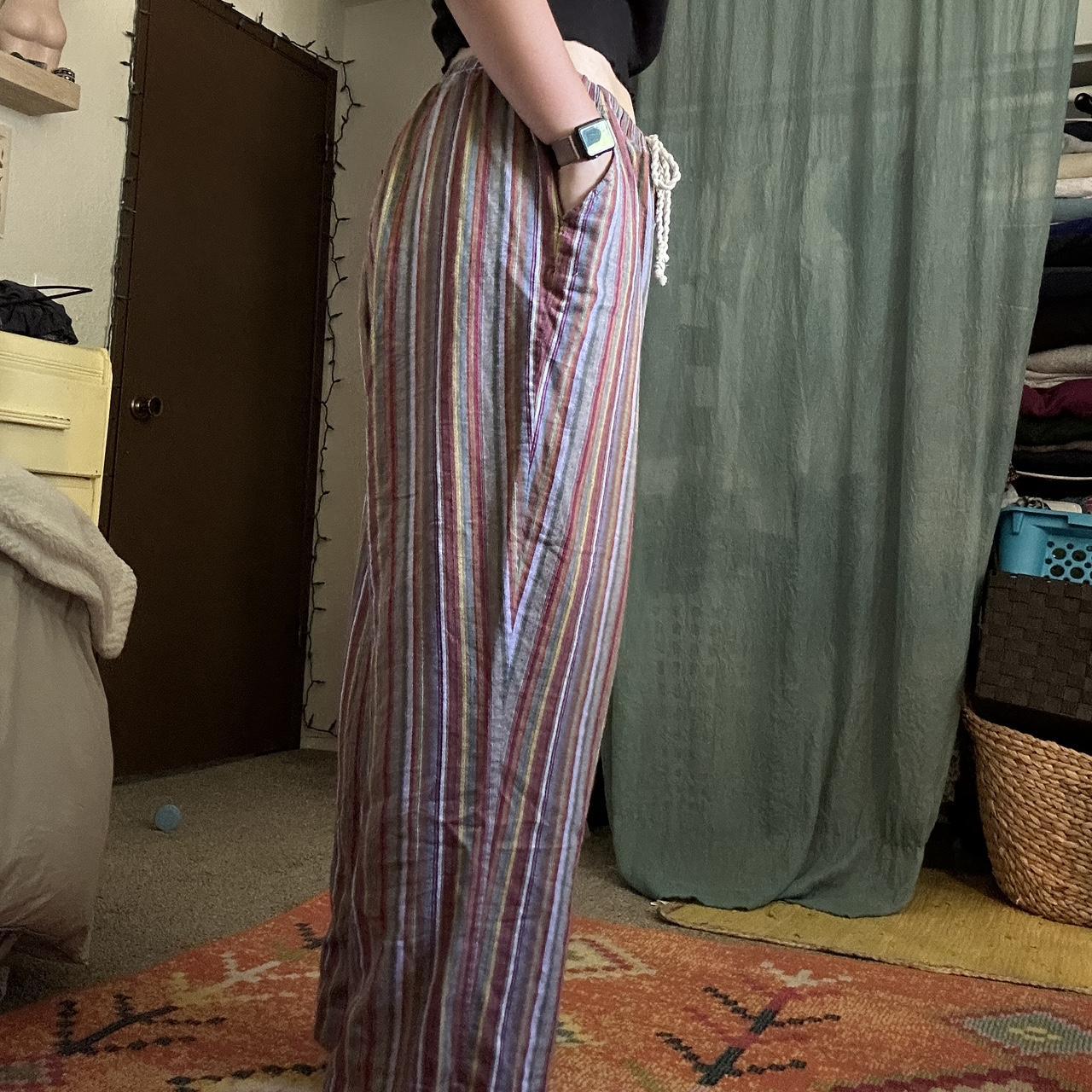 Multi color wide leg patterned pants. Size: 26 but... - Depop