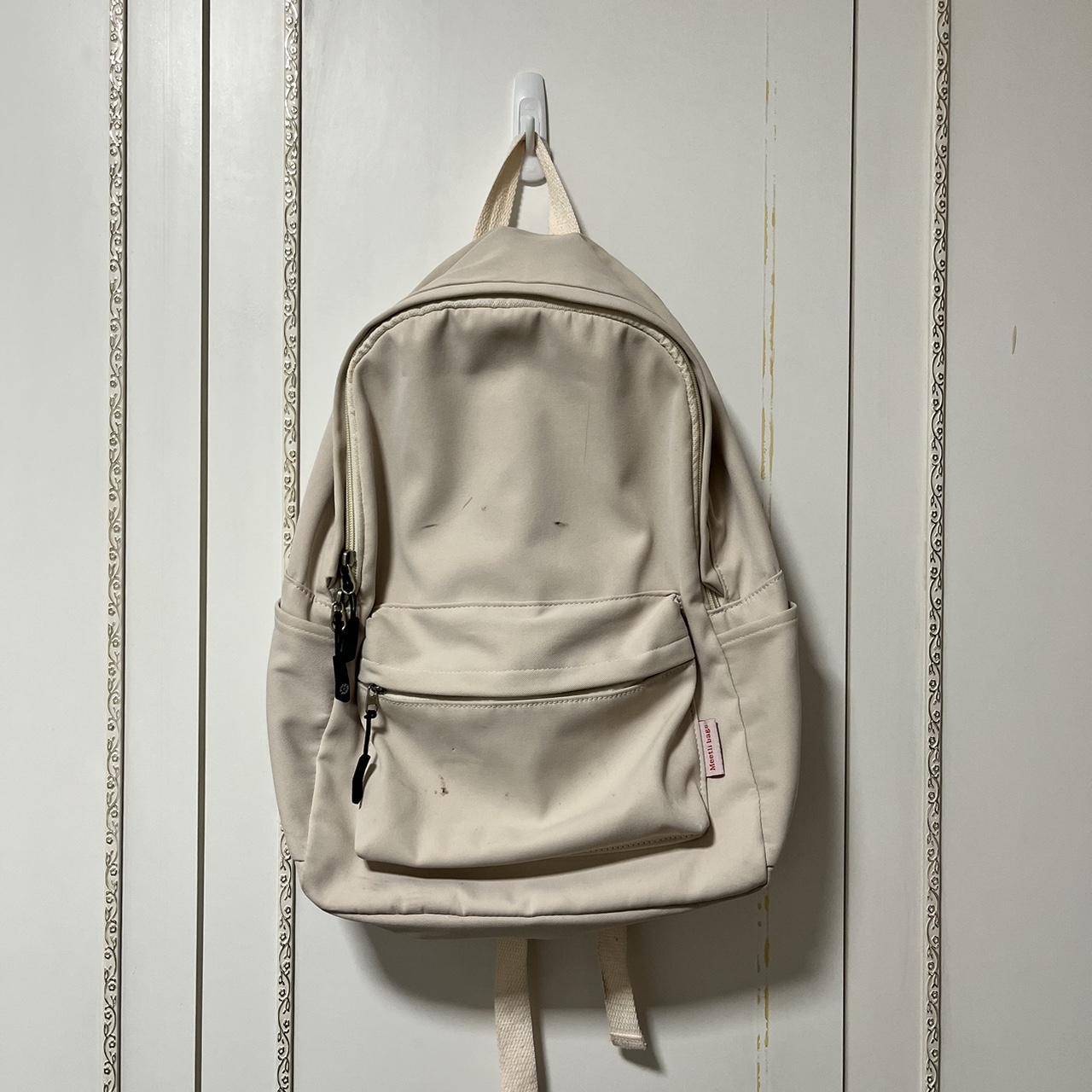 White backpack with one back pocket and a front... - Depop
