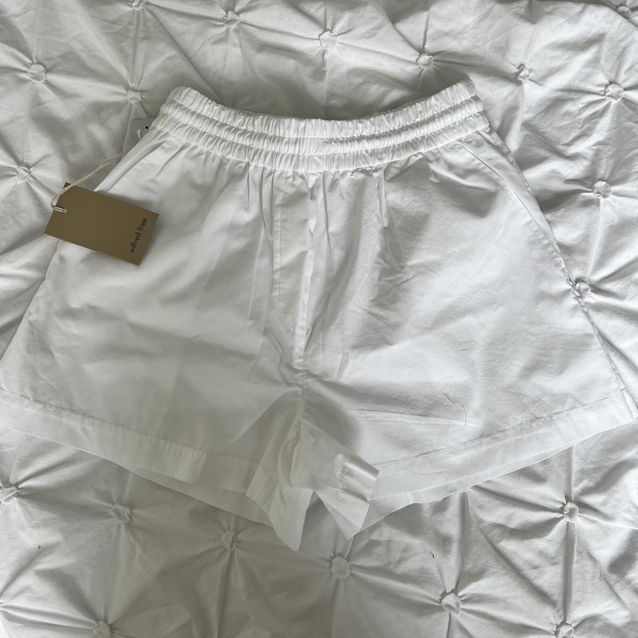 Wild free white boxer shorts from Aritizia, never worn - Depop