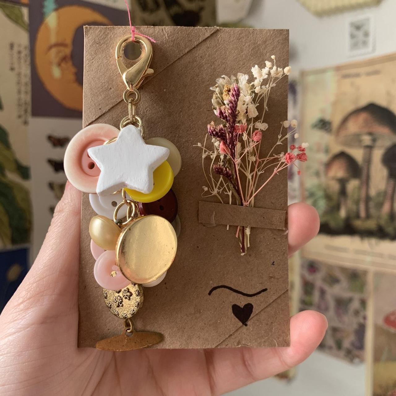 golden pink star & button keychain reminds me of... - Depop