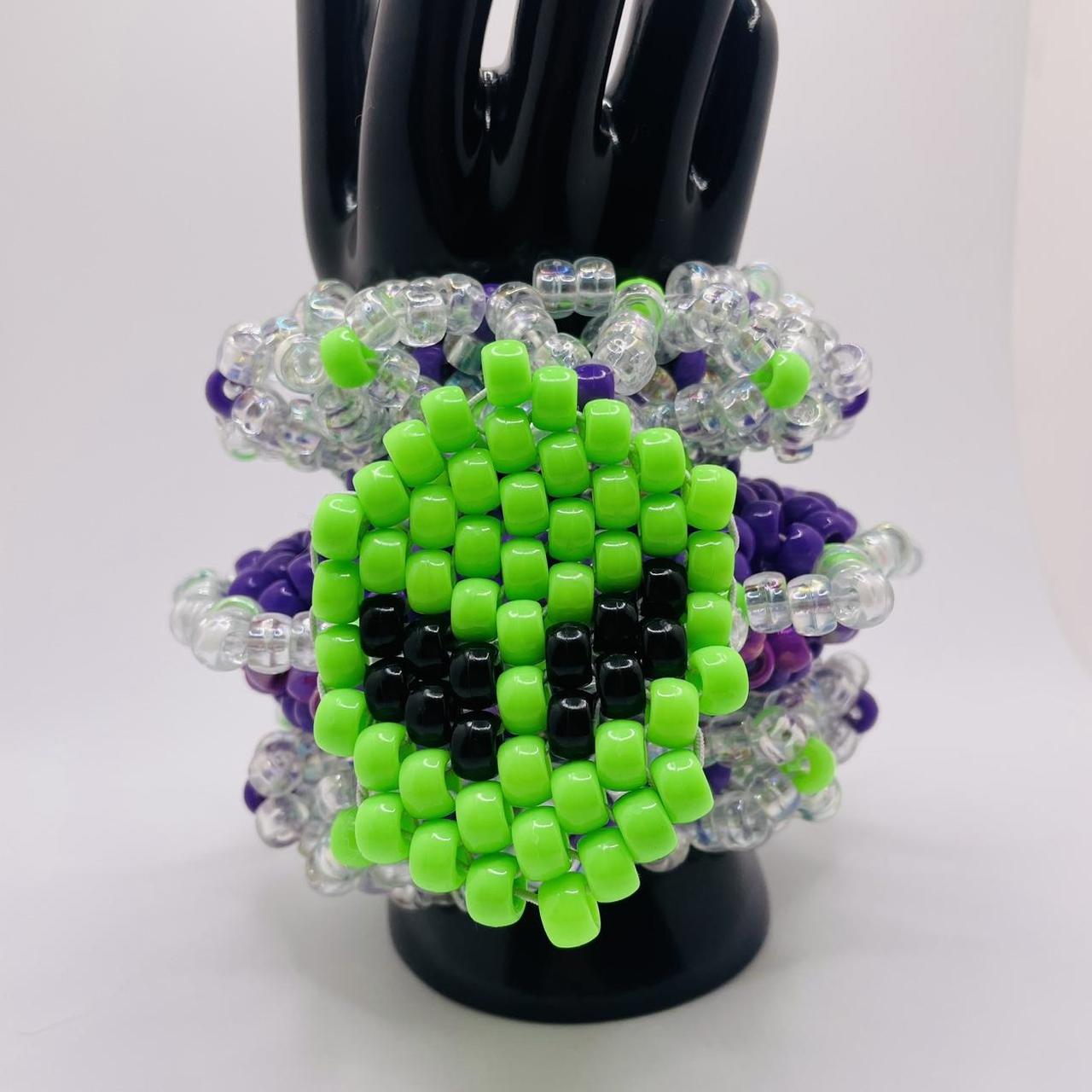 Green and purple rotating UFO alien head Kandi cuff... | Depop
