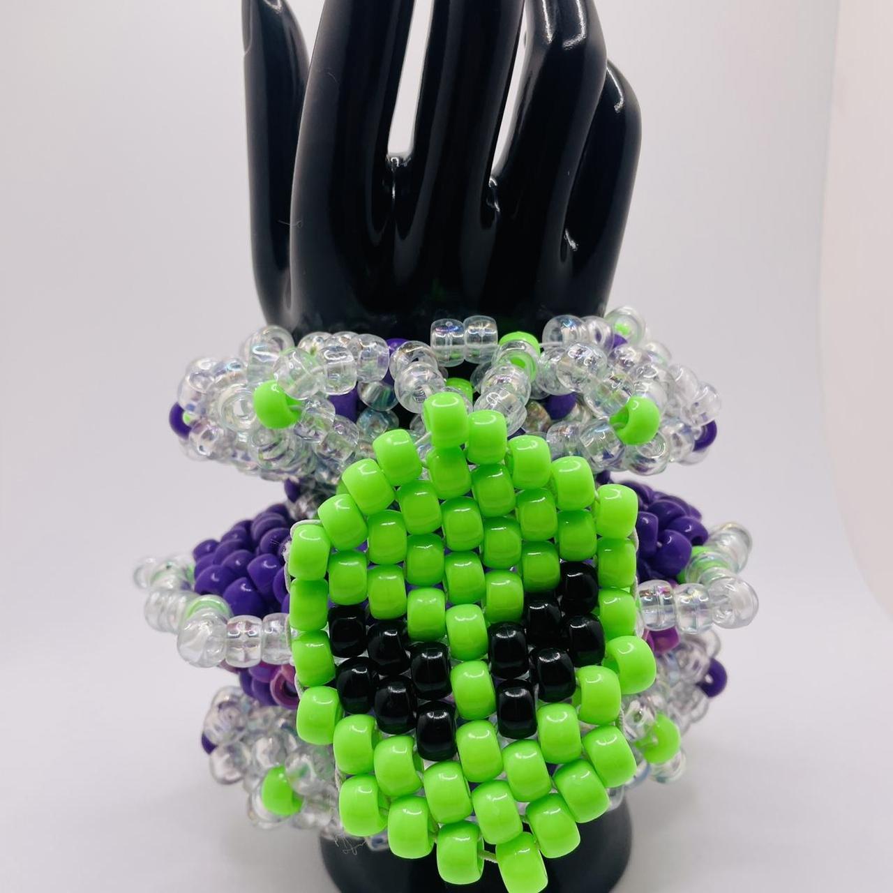 Green and purple rotating UFO alien head Kandi cuff... | Depop