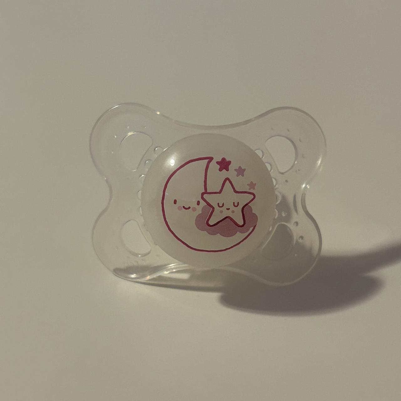 This super cute paci is originally a baby size paci... - Depop
