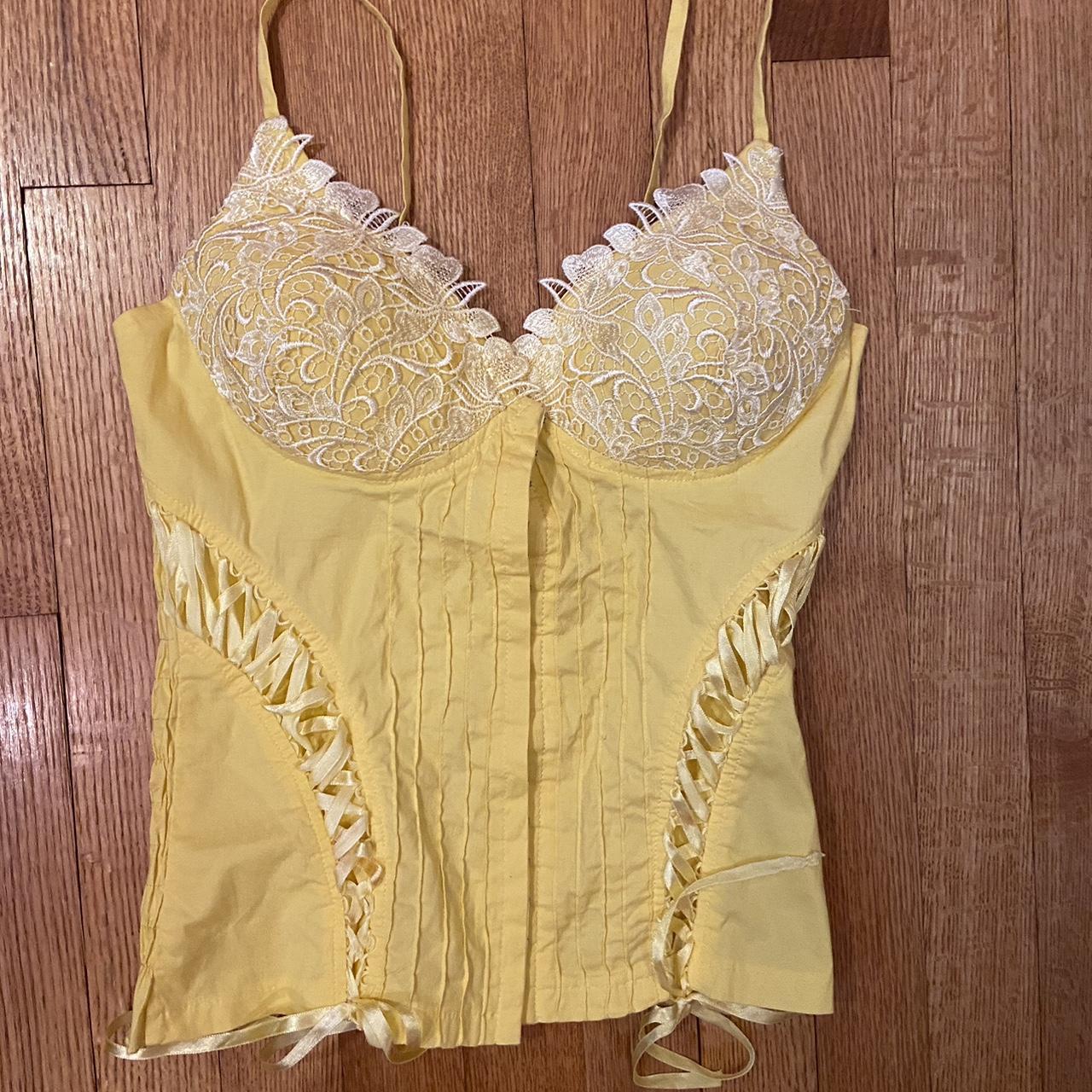 Yellow corset top. Clips in at the front and... - Depop