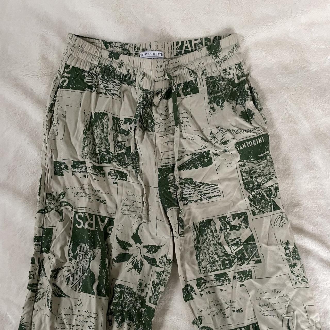Urban Outfitters news paper pants light and... - Depop