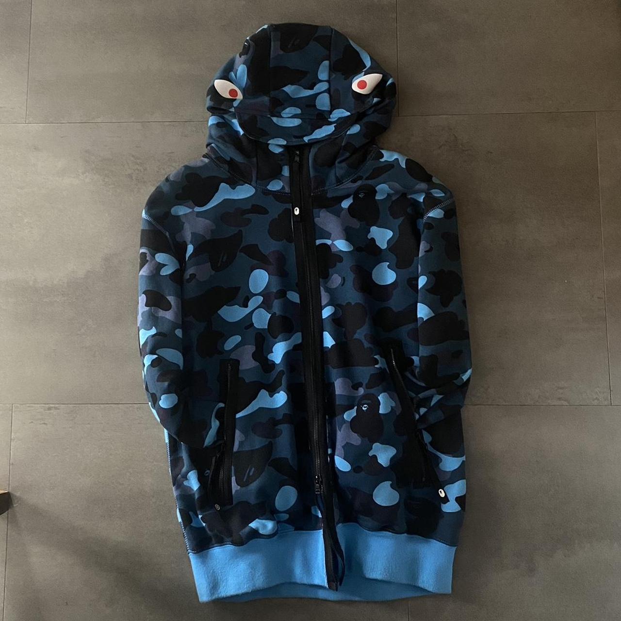 Blue Bape camo zip hoodie Says xl but fits mik a M - Depop