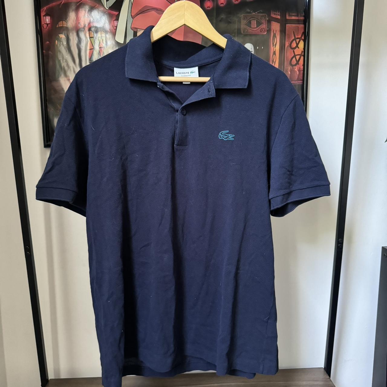 Men’s Lacoste polo in navy. Labelled a US XL but... - Depop