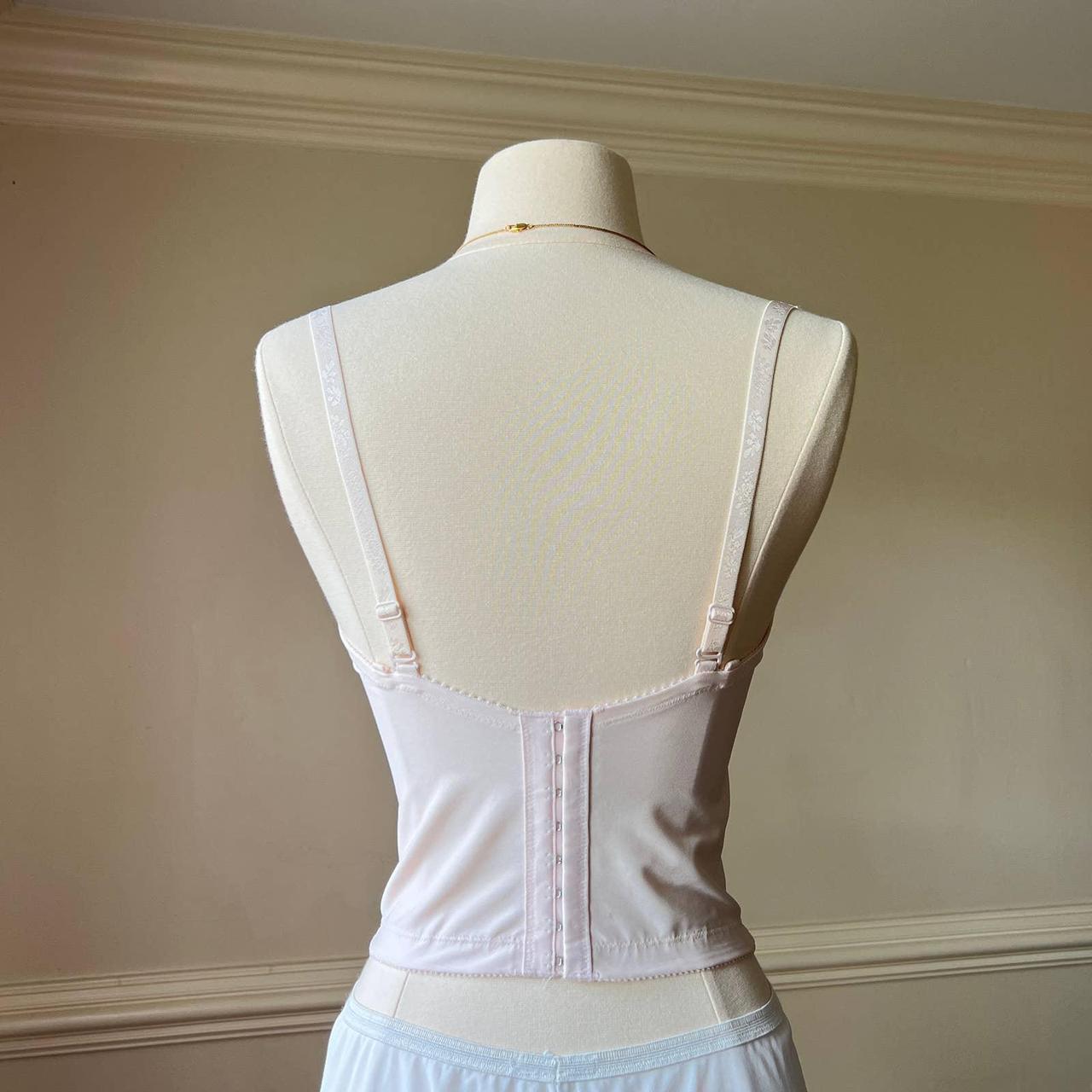 Vintage-inspired pastel corset featuring rosette... - Depop