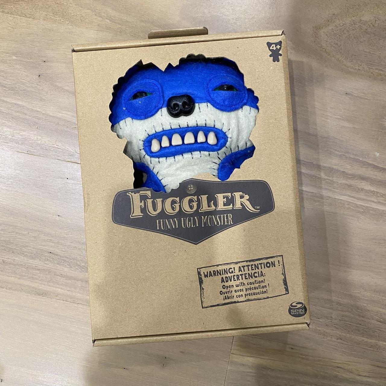 Blue SUSPICIOUS FOX Fuggler Was part of a gift... - Depop