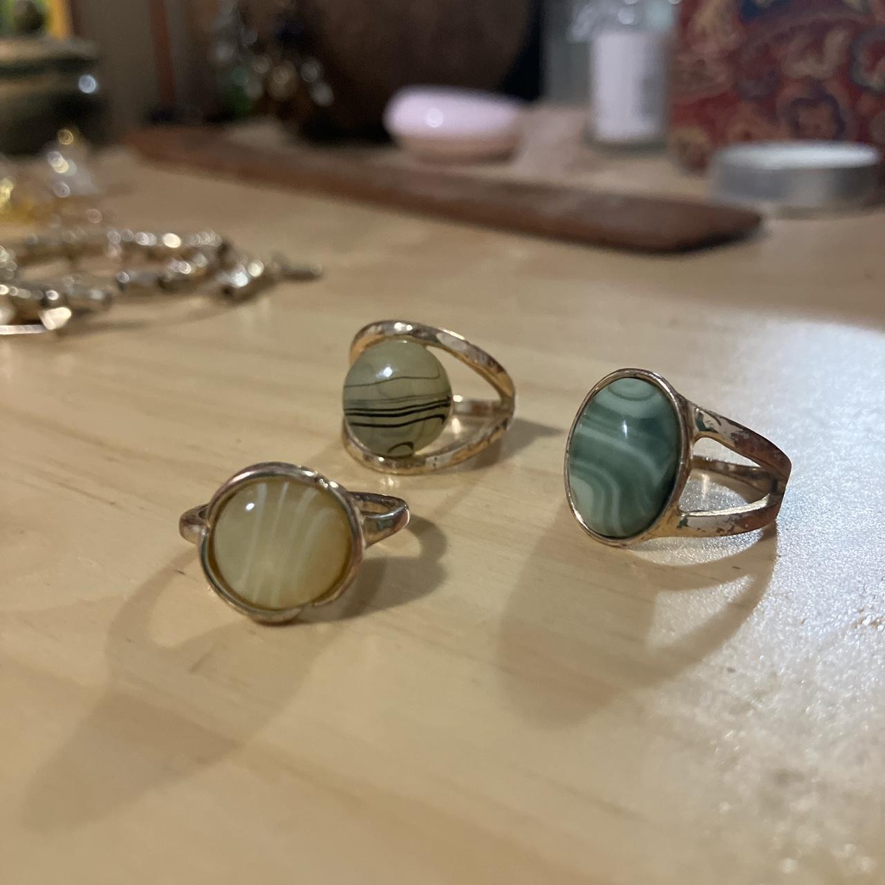 H&M gold rings, coloured stones with swirl details.... - Depop