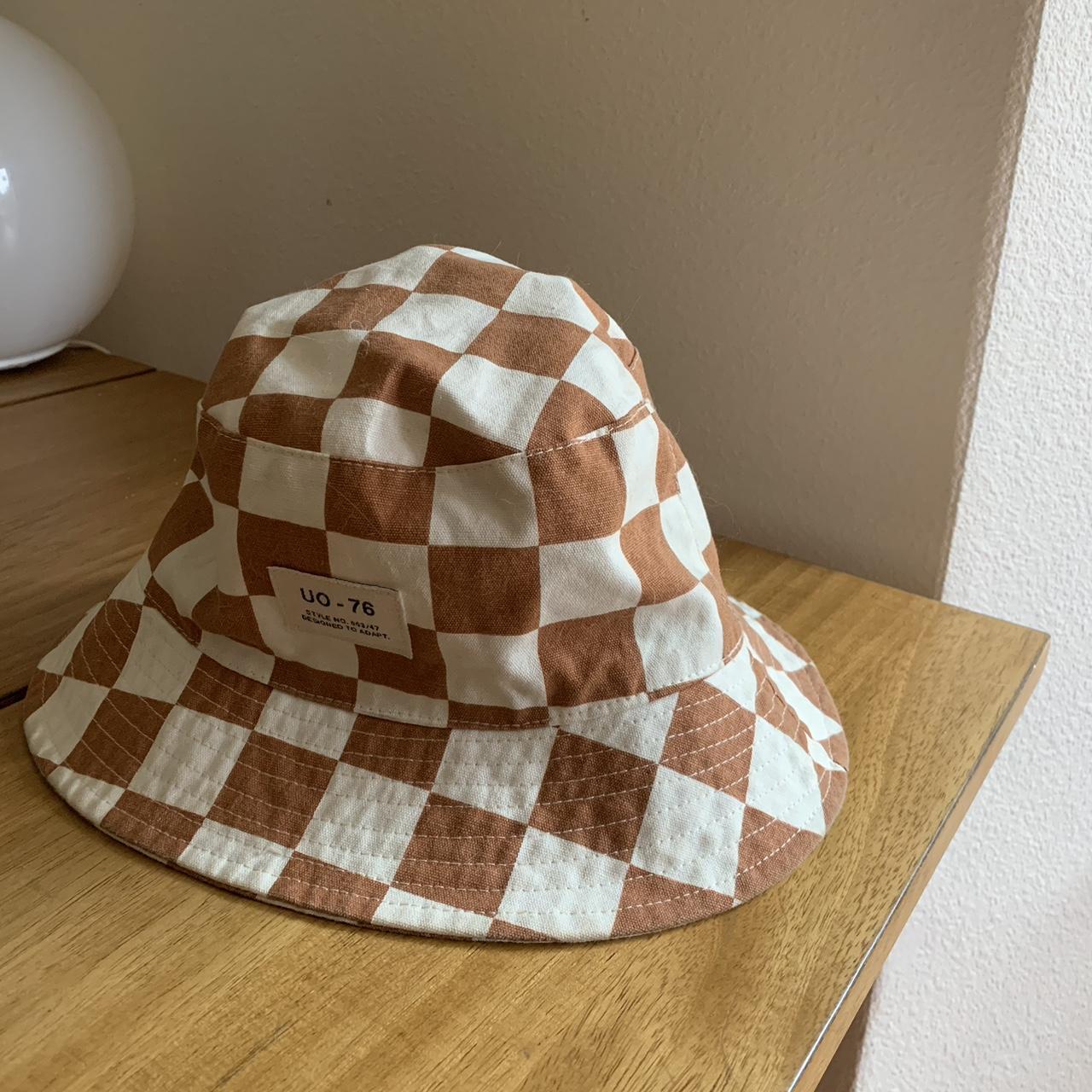 Checkered bucket hat from Urban... - Depop