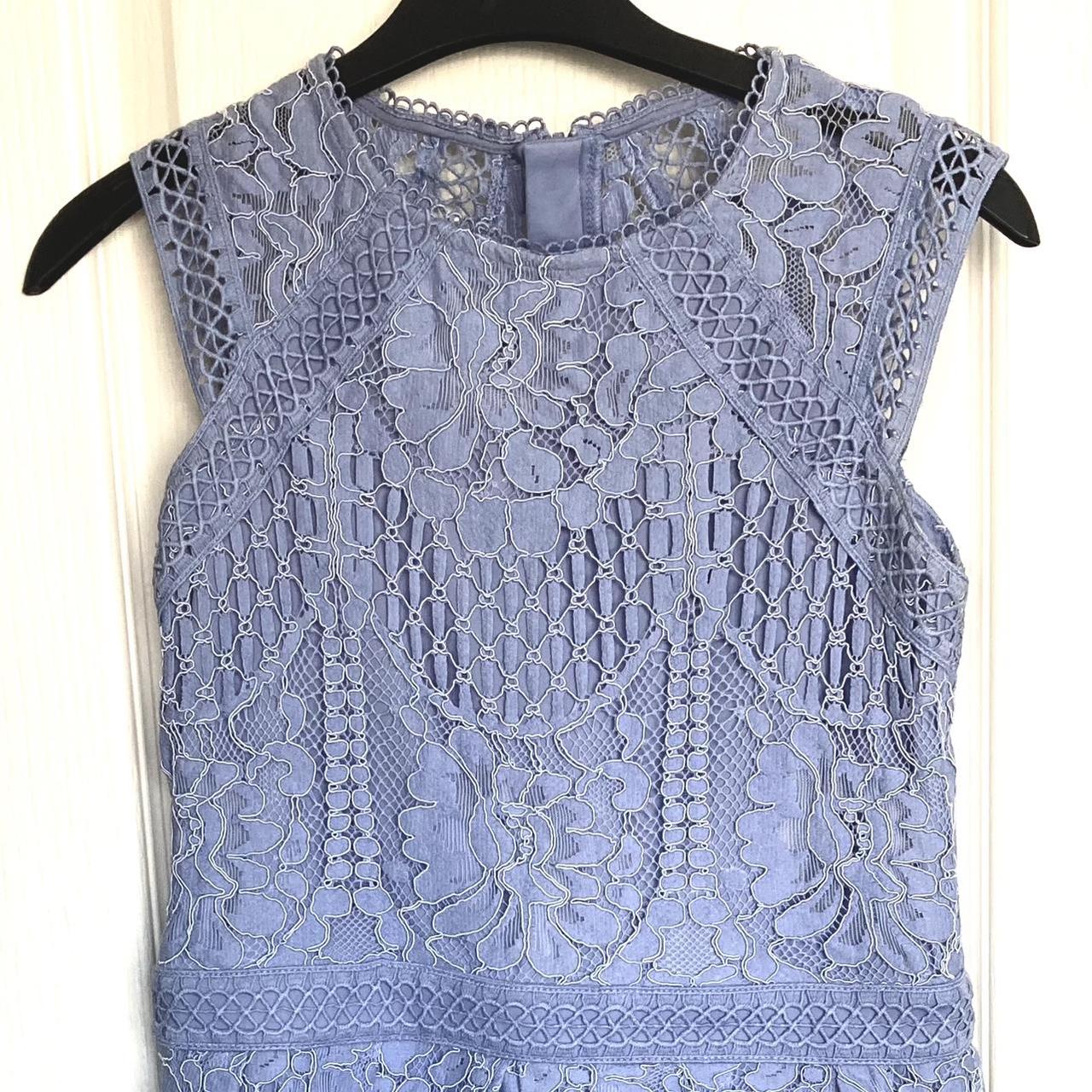 Brand new Lipsy blue lace mini dress with a zip at... - Depop