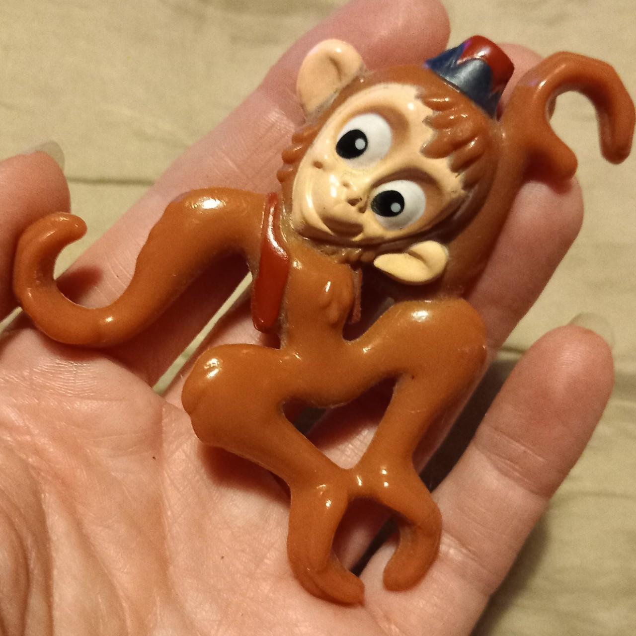 90's Abu figure from Aladdin Can hang from things... | Depop