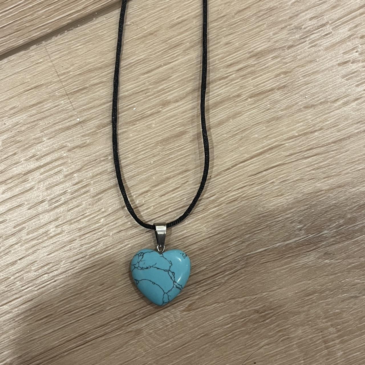 Turquoise stone heart necklace on a black cord... - Depop