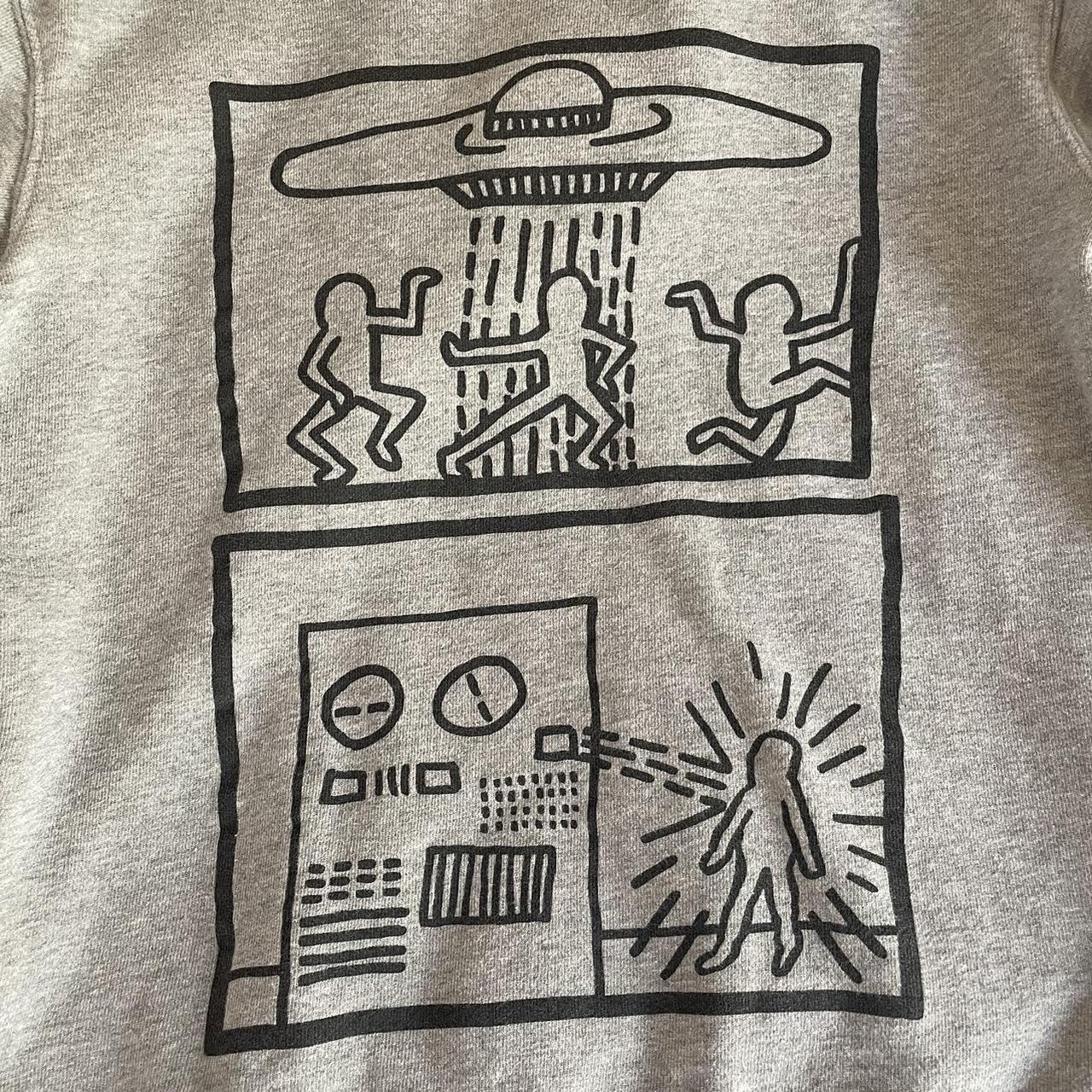 Grey graphic keith haring alien ufo comic... - Depop