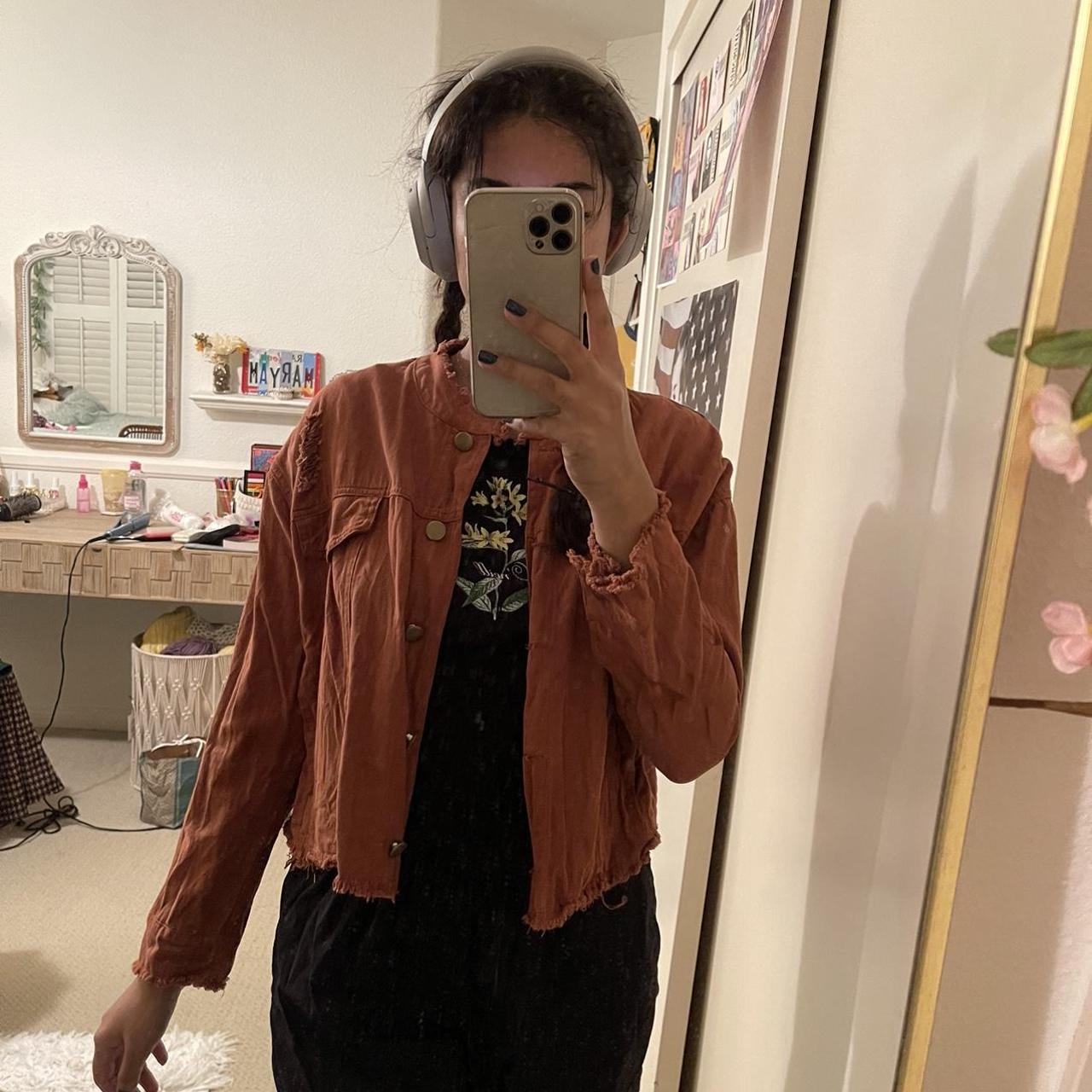 small rust colored jacket, ripped denim look - Depop