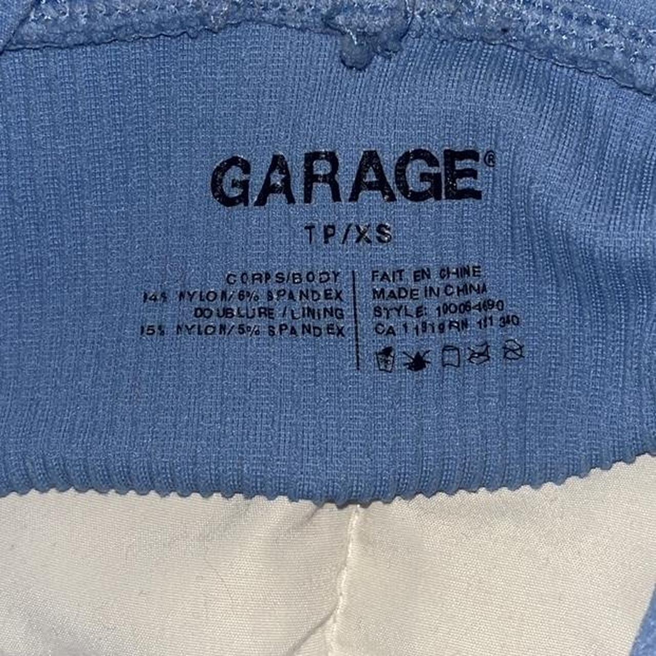 Super cropped women’s garage top size small or XS... - Depop