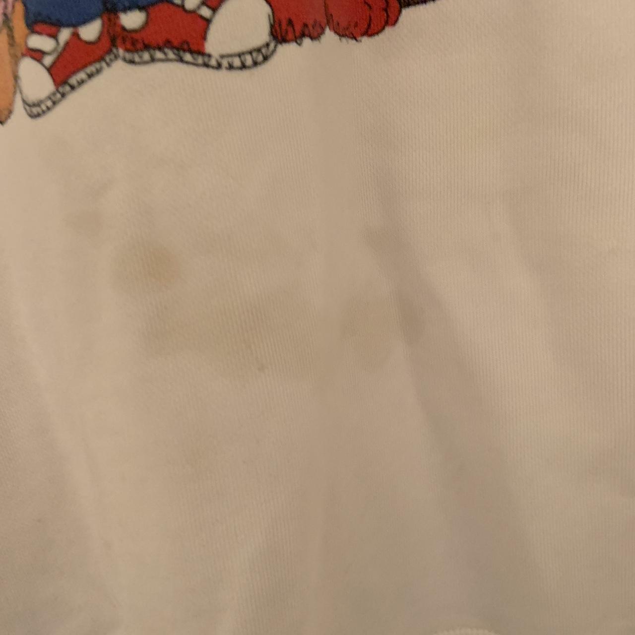 kaws sesame street sweater couple of sweat stains... - Depop