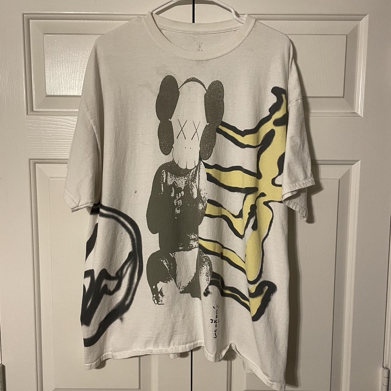 kaws x travis tee super clean graphic on this minor... - Depop